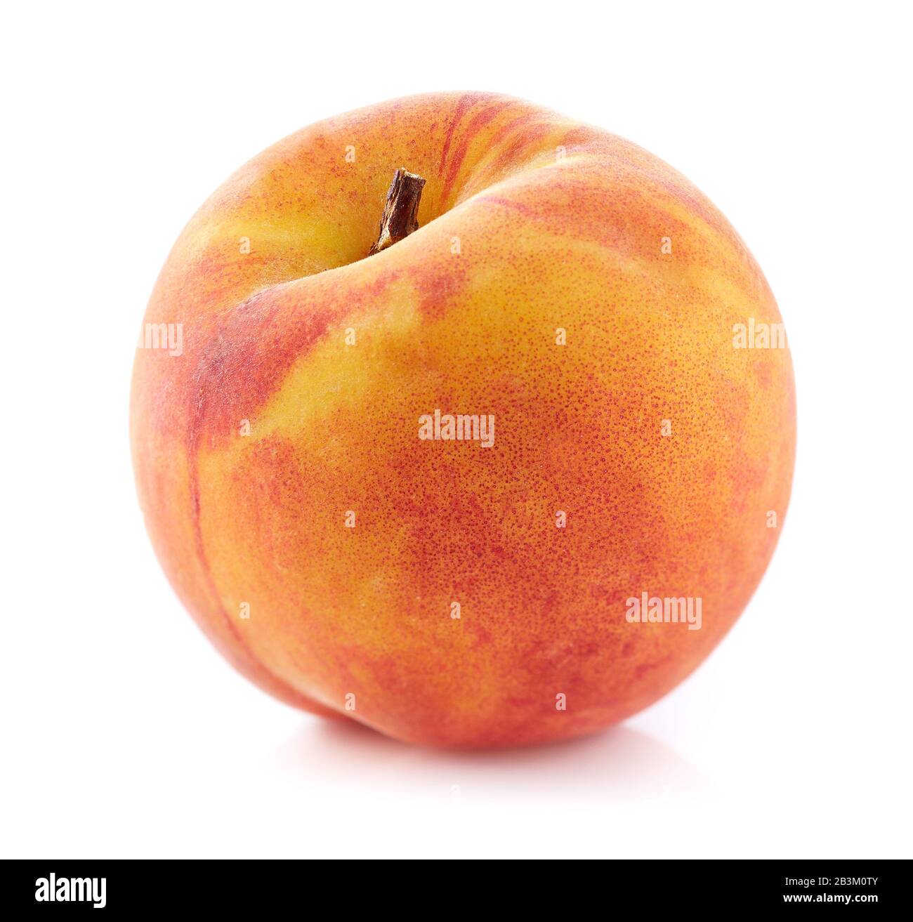 One peach in closeup Stock Photo - Alamy