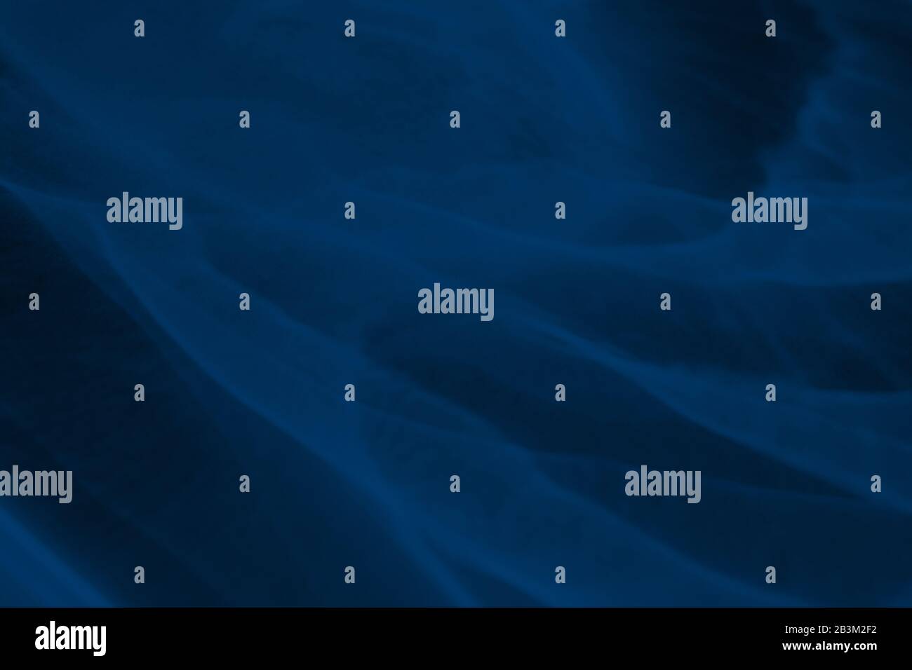 blue colored abstract background with light and shadows caustic effect ...