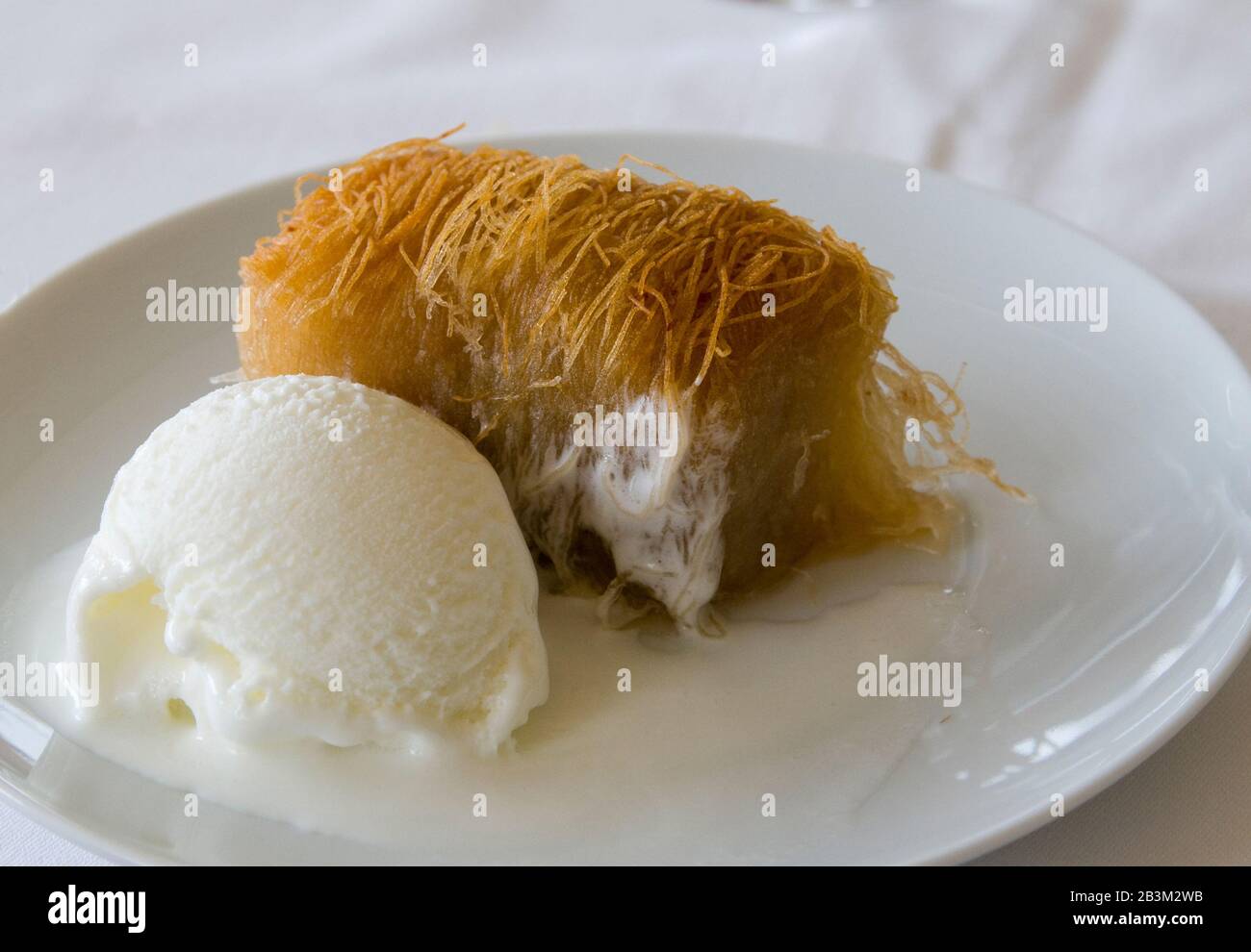 Kataifi is a popular Middle Eastern pastry. This form of kataifi is ...