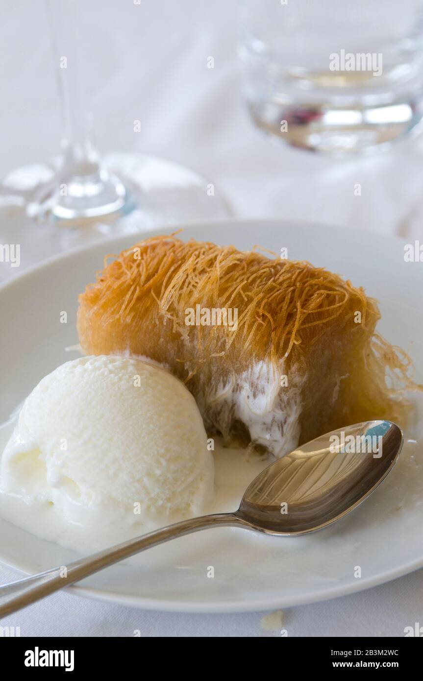 Kataifi is a popular Middle Eastern pastry. This form of kataifi is ...