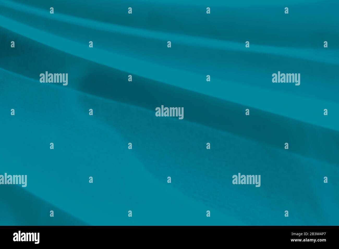 Blue colored abstract background with light and shadows caustic effect ...