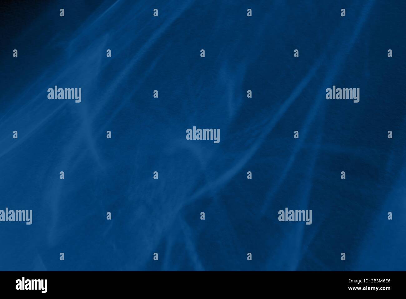 blue colored abstract background with light and shadows caustic effect ...