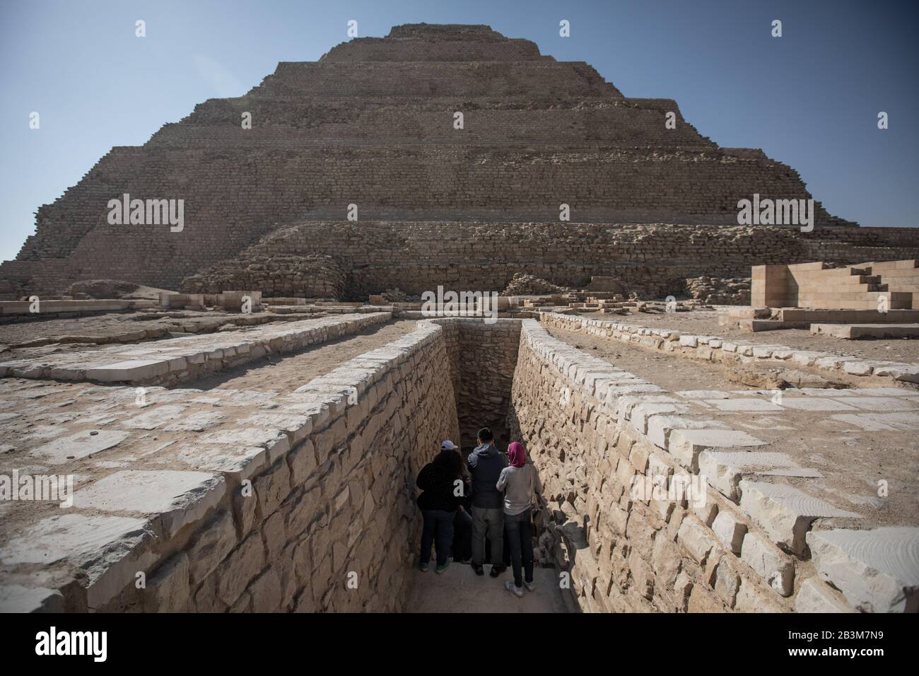 Saqqara, Egypt. 05th Mar, 2020. People enter the Pyramid of Djoser in ...