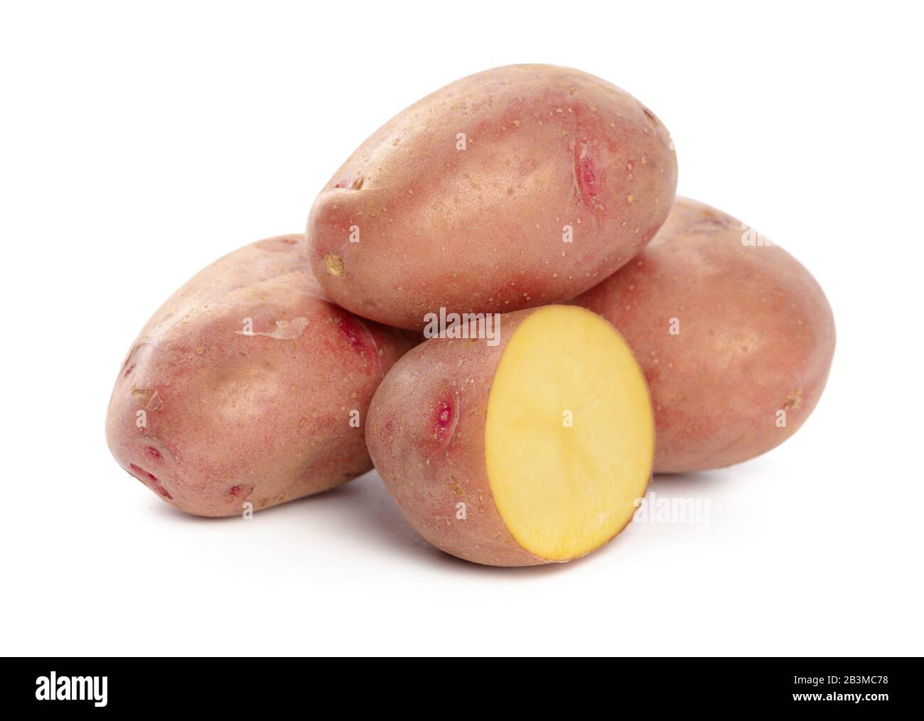 raw potato tuber with slices isolated on white Stock Photo - Alamy