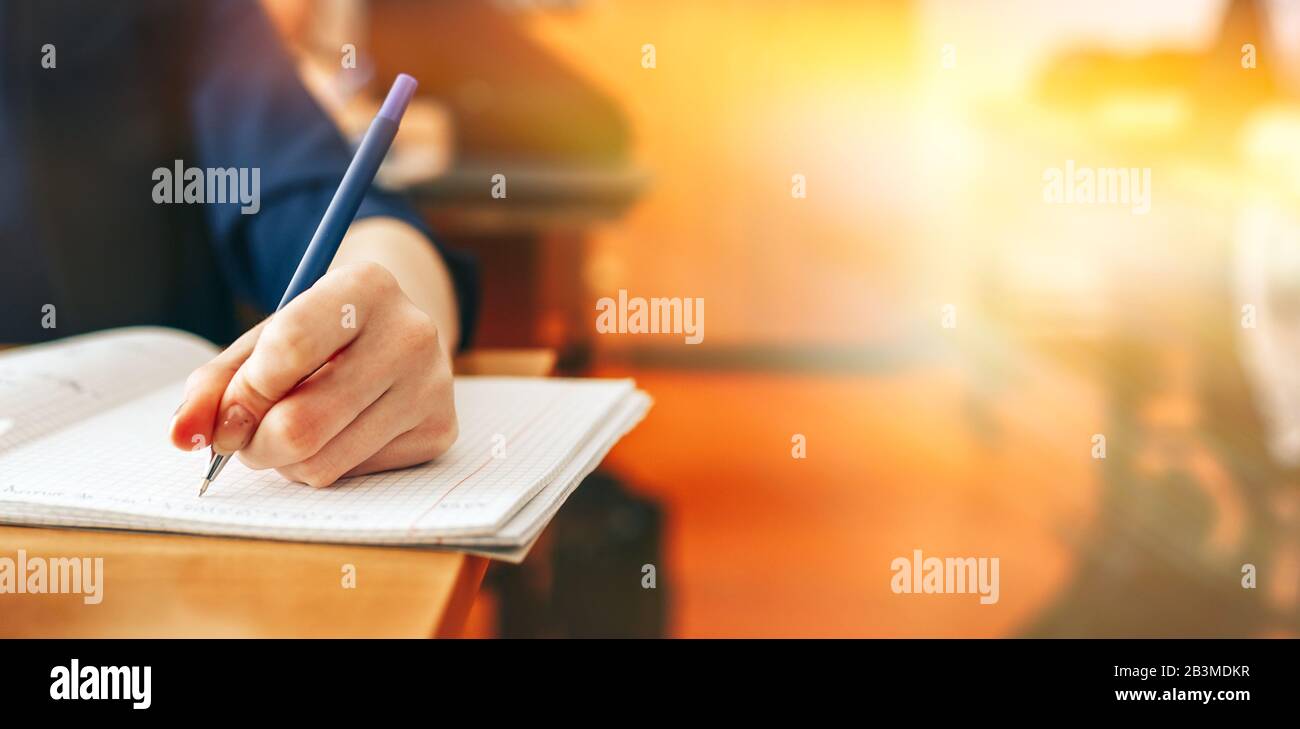 Students writing exam uniform hi-res stock photography and images - Alamy