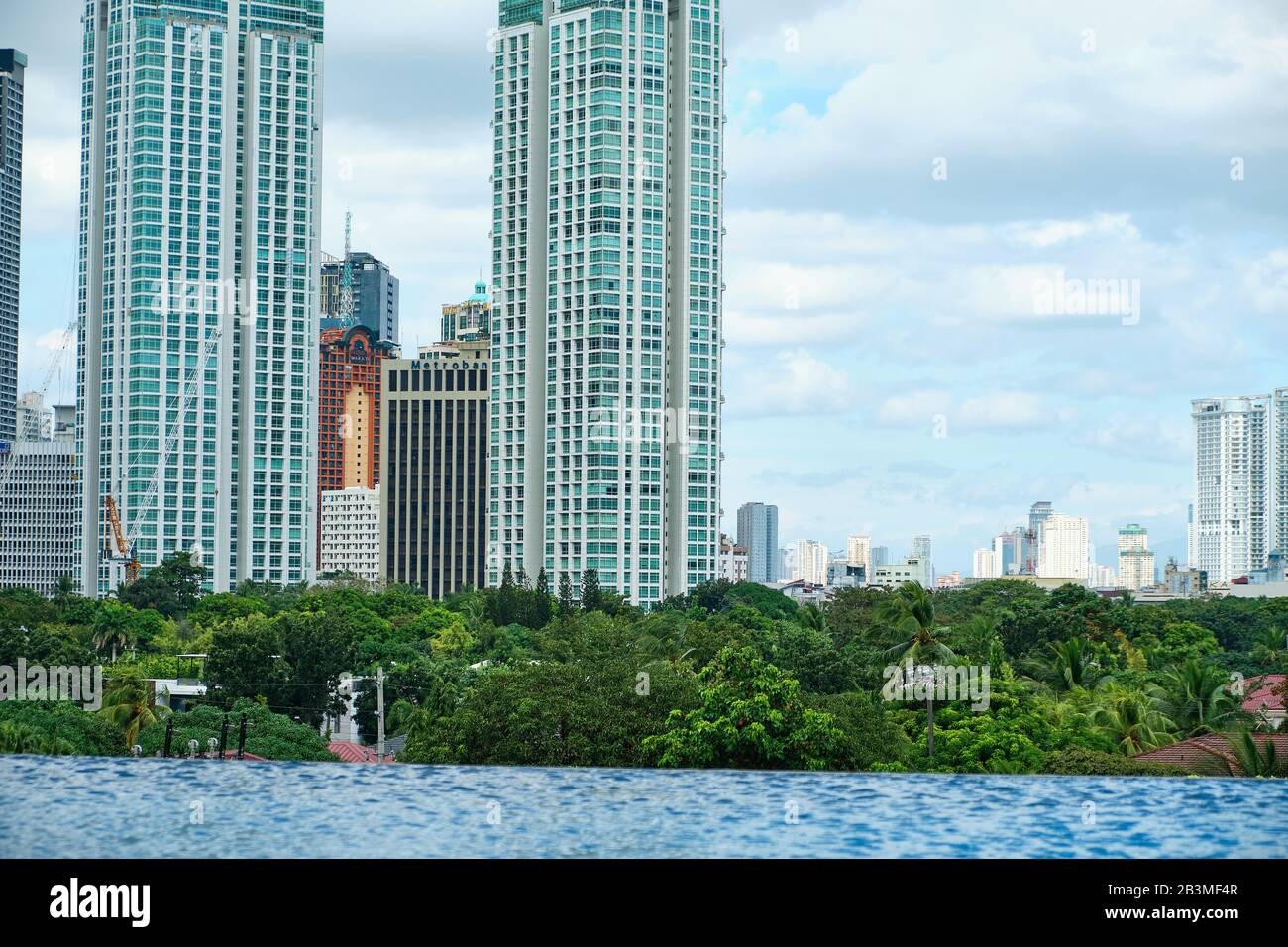 View of the city of Manila from the pool of the luxury five-star ...