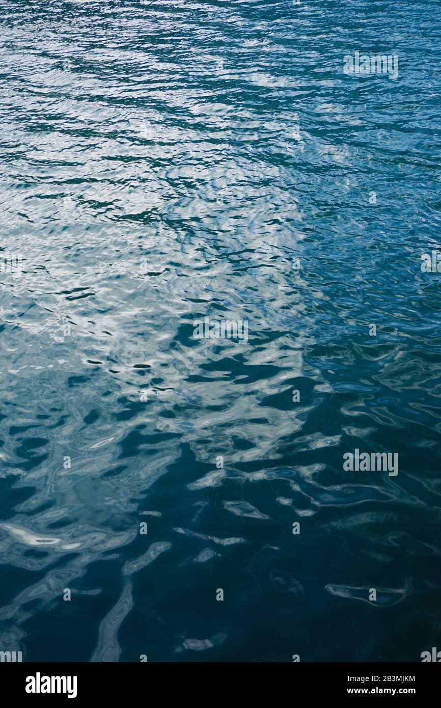 reflection on the blue water Stock Photo - Alamy