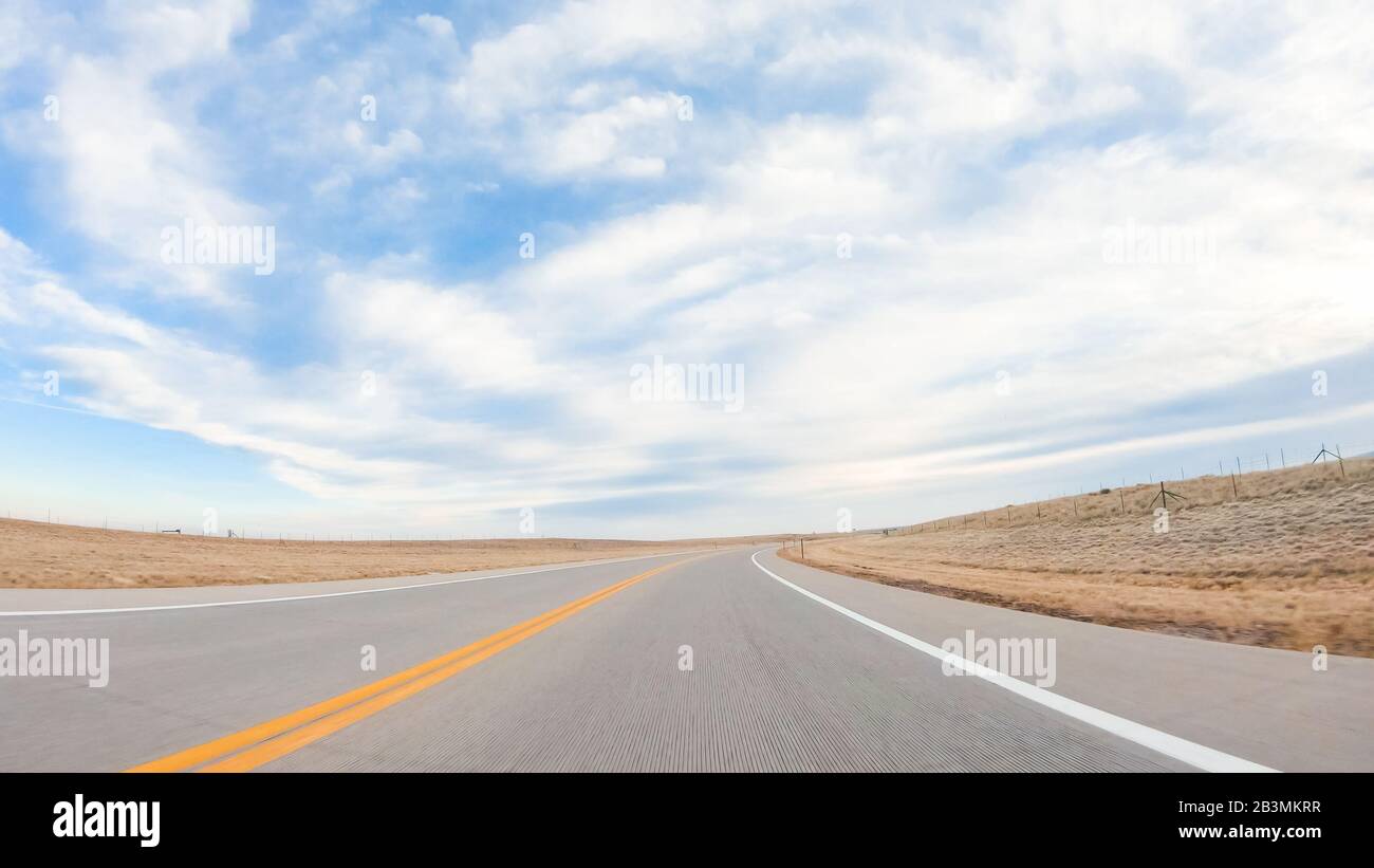 Driving on paved road in rural area Stock Photo - Alamy
