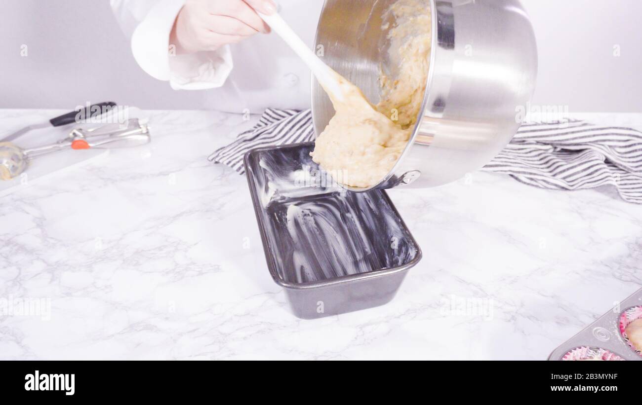 Step by step. Pouring banana bread batter into a loaf pan to bake ...