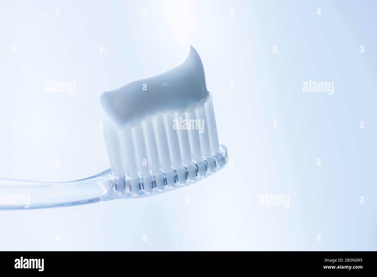 Blue transparent toothbrush hi-res stock photography and images - Alamy