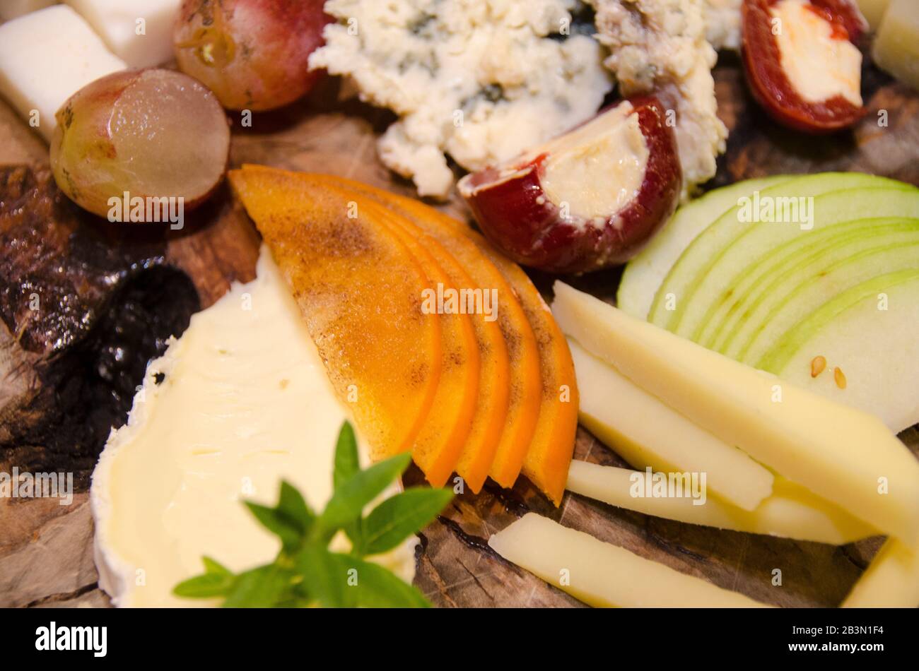 Finger food, snacks and various cheese sandwiches laid out on a table ...