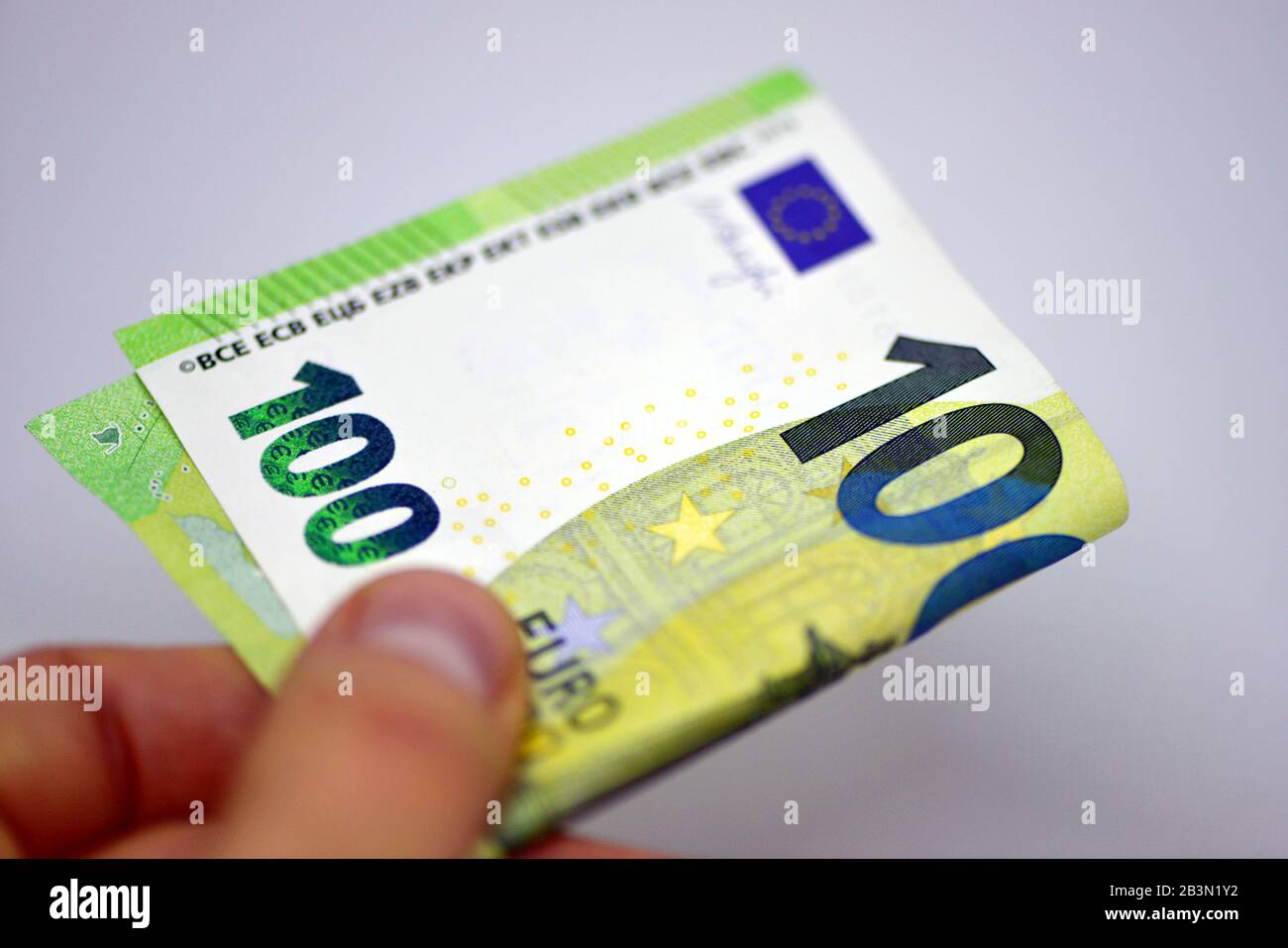 100 Euro banknotes isolated on a white background Stock Photo - Alamy