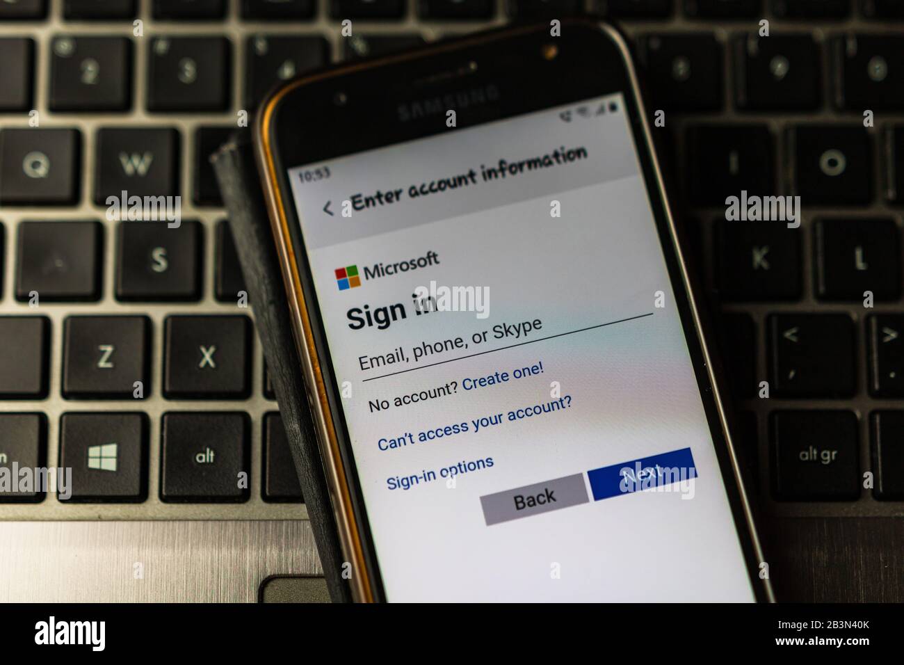 Sign in Microsoft account on smartphone screen pixelated close up view ...