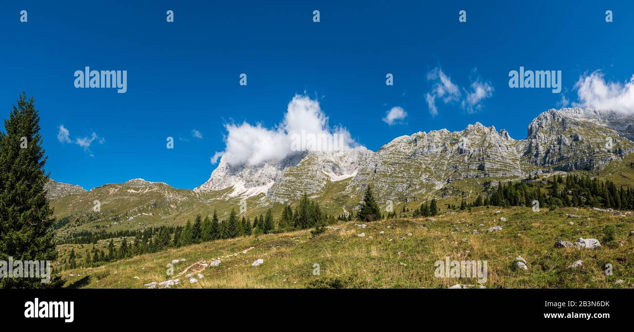 Panorama view of mountain peaks over Montasio Plateau, with Jof di ...