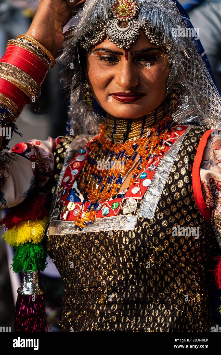 Dancer in brightly coloured traditional clothing in the inauguration ...