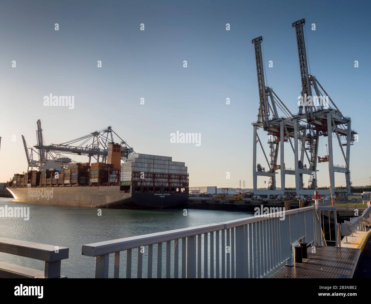 Port area of Le Havre showing heavy lift dock cranes and container ship ...
