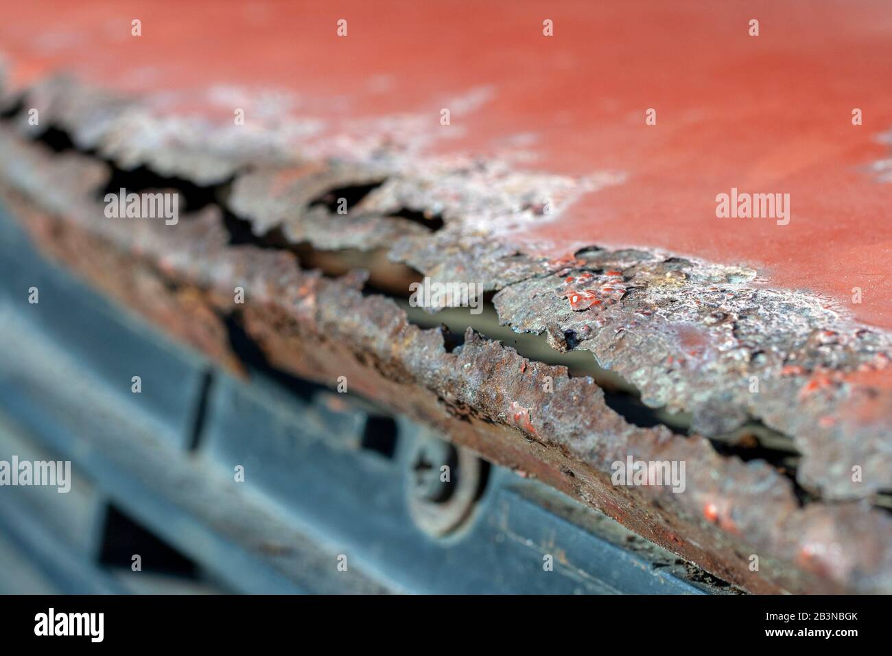 Close up shot of rusted body parts on an old car Stock Photo - Alamy