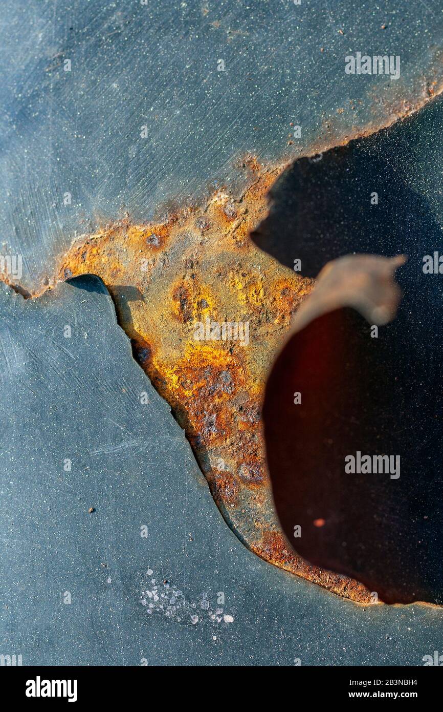 Close up shot of rusted body parts on an old car Stock Photo - Alamy