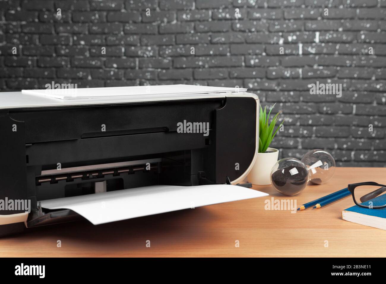 Copier or printer in a modern office interior close up Stock Photo - Alamy
