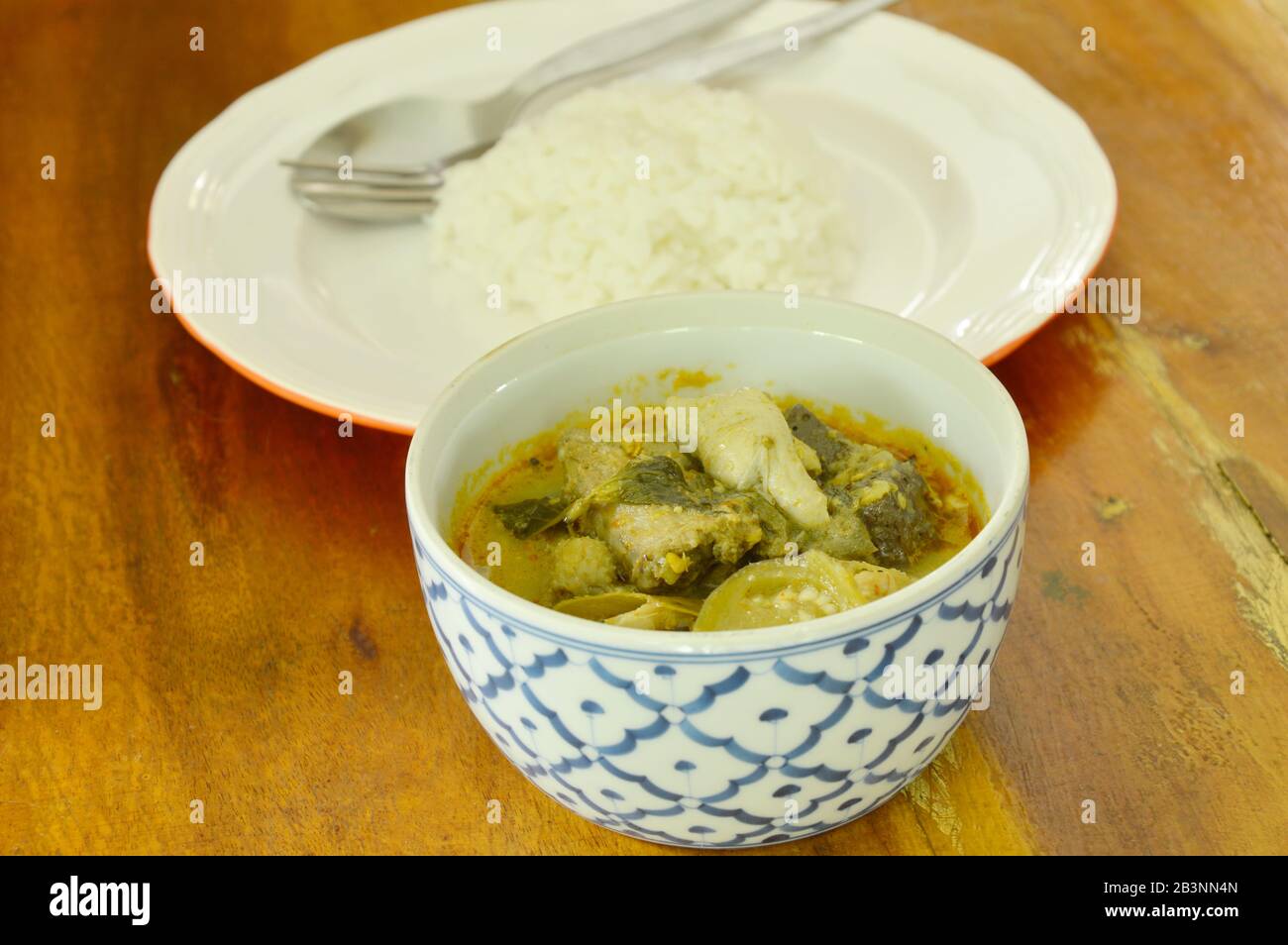 spicy chicken green curry eat couple with rice Stock Photo - Alamy