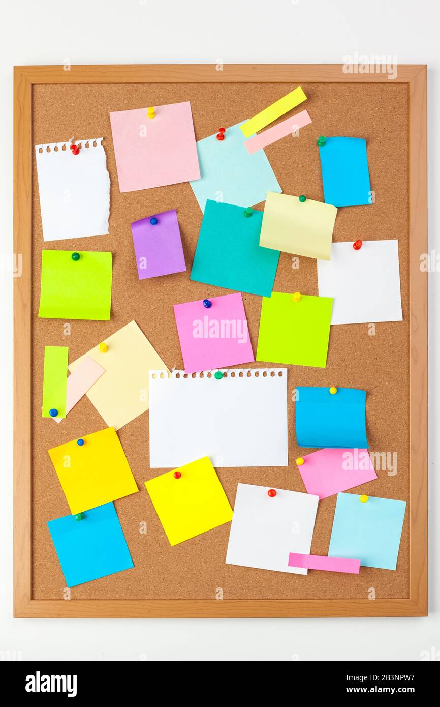Cork board with several colorful blank notes with pins Stock Photo - Alamy