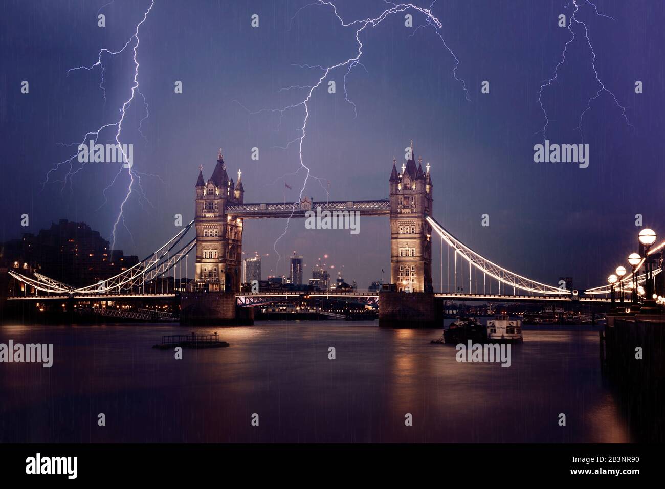 Tower bridge by night in bad weather. Rainy London weather Stock Photo ...