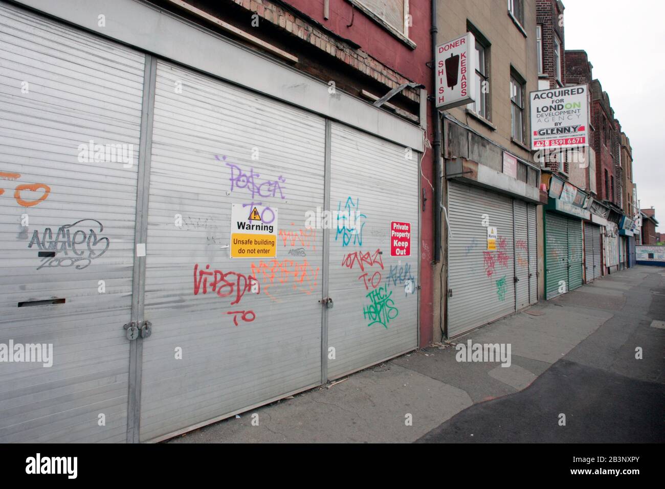 Boarded up closed shops in rundown area awaiting regeneration Dagenham ...