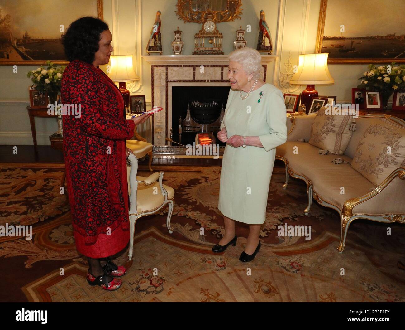 Queen Elizabeth II (right) presents Lorna Goodison with the Queen's ...