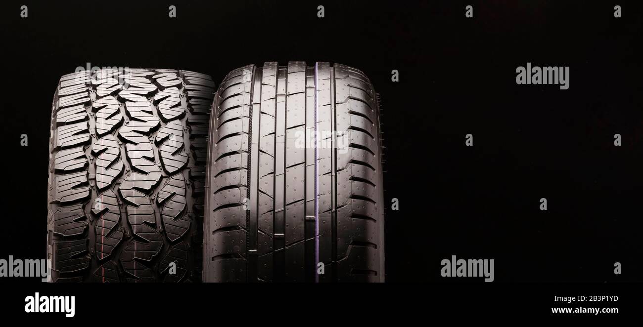 a mud tire for pickups and trucks and a passenger tire side by side ...
