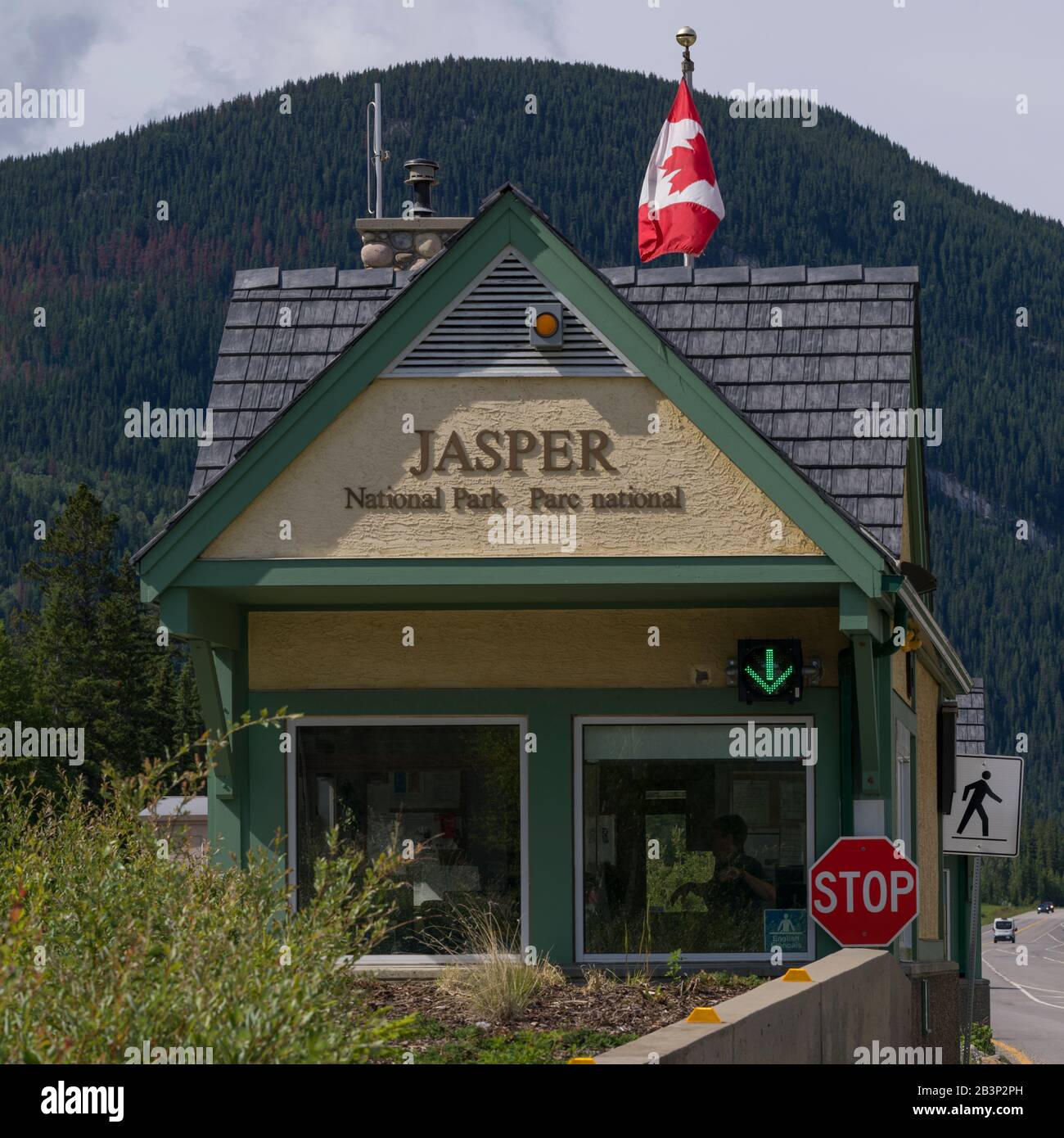 Building at Jasper National Park entrance with mountain range in the ...