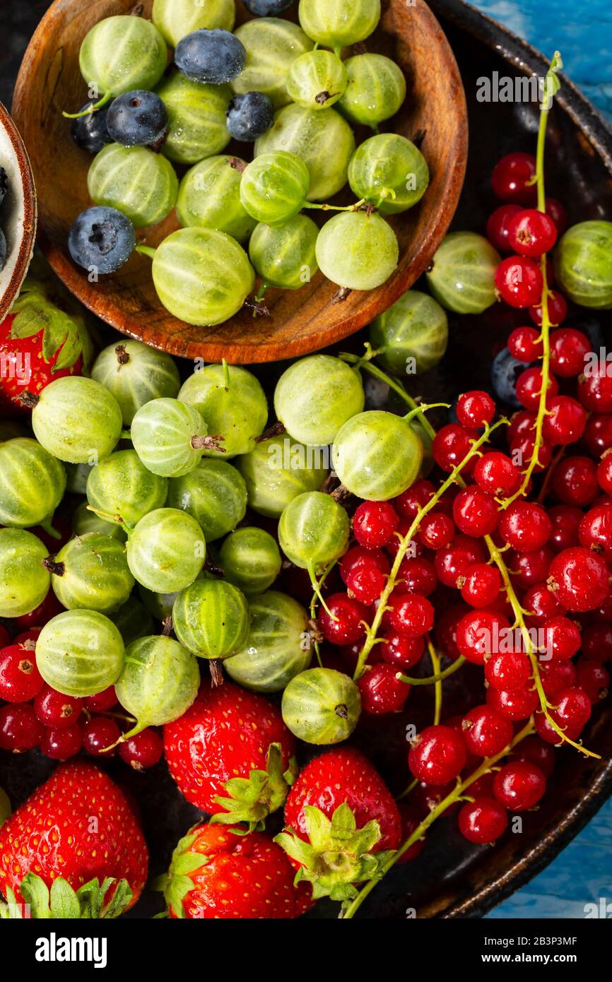Strawberry and other summer berry close up Stock Photo - Alamy