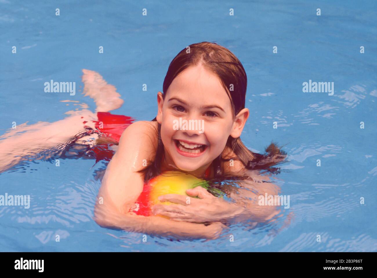 Holding Beachball High Resolution Stock Photography and Images - Alamy