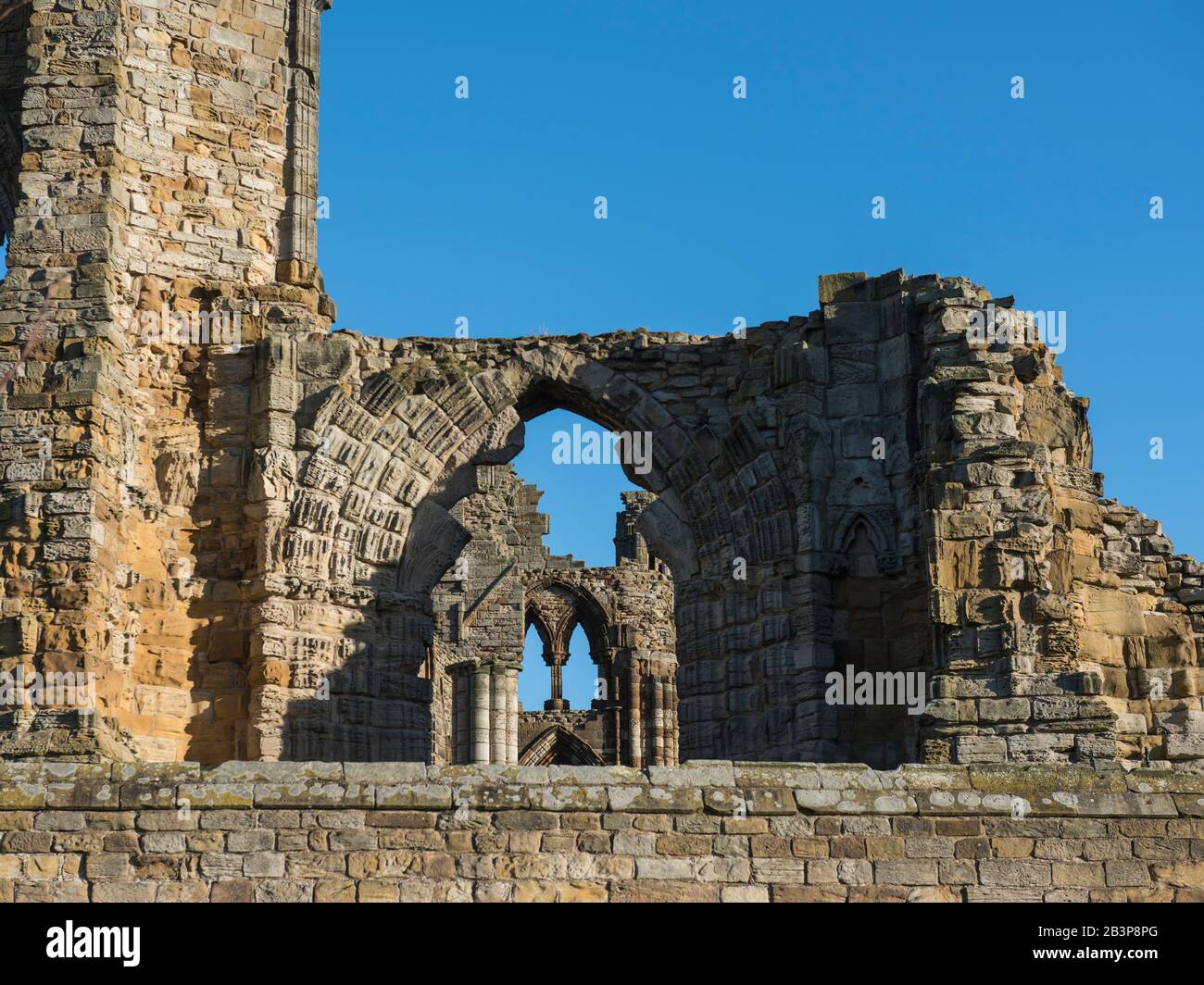 Remains of an ancient english abbey ruins showing details of gothic ...