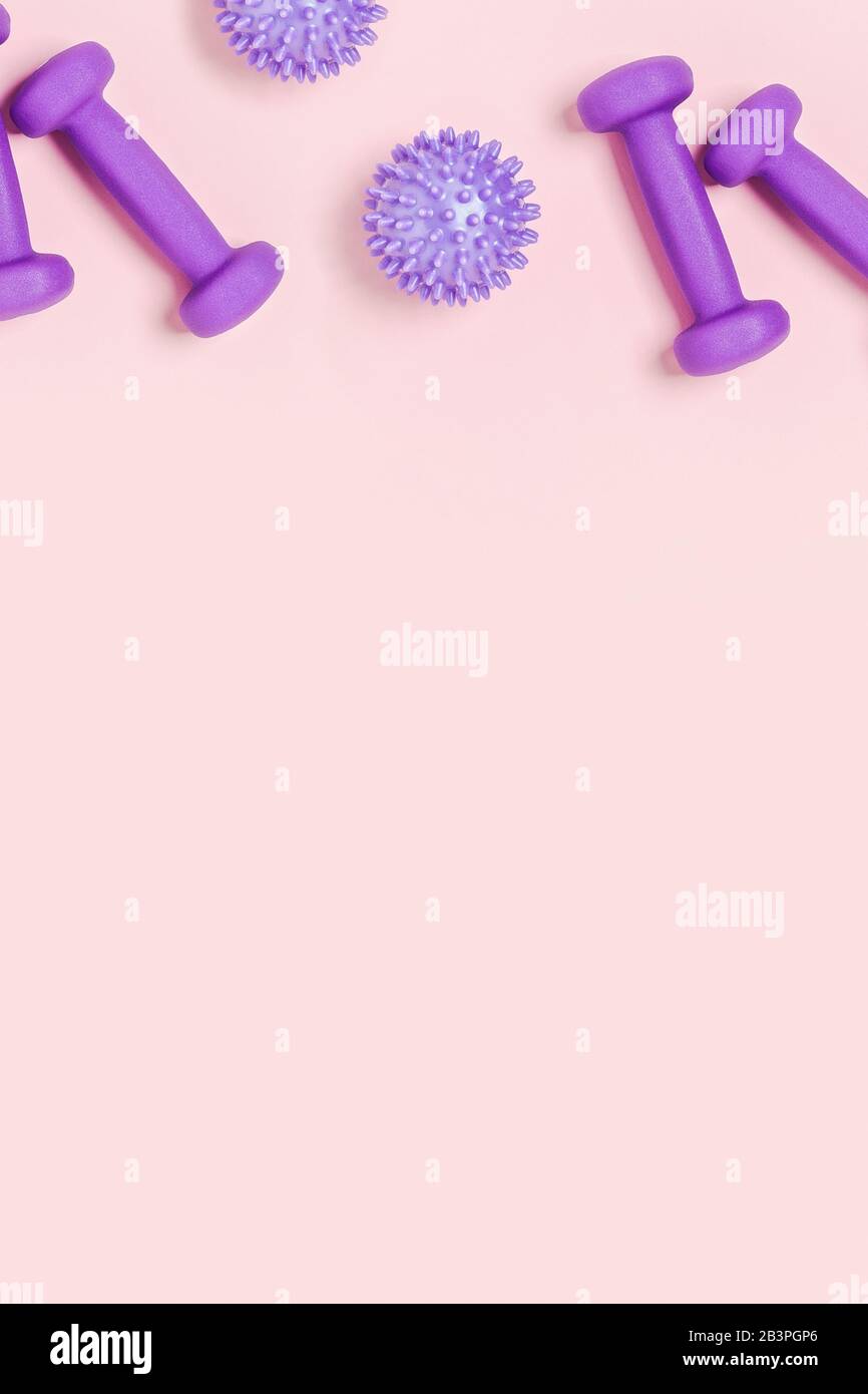 Sports equipment for women's training in pastel colored. Pink ...