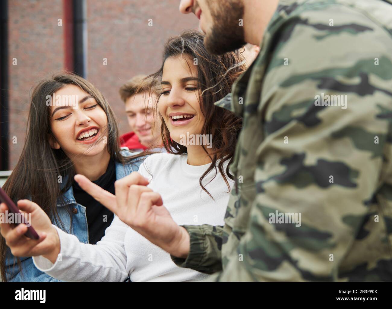 Chilling outdoors with best friends Stock Photo - Alamy