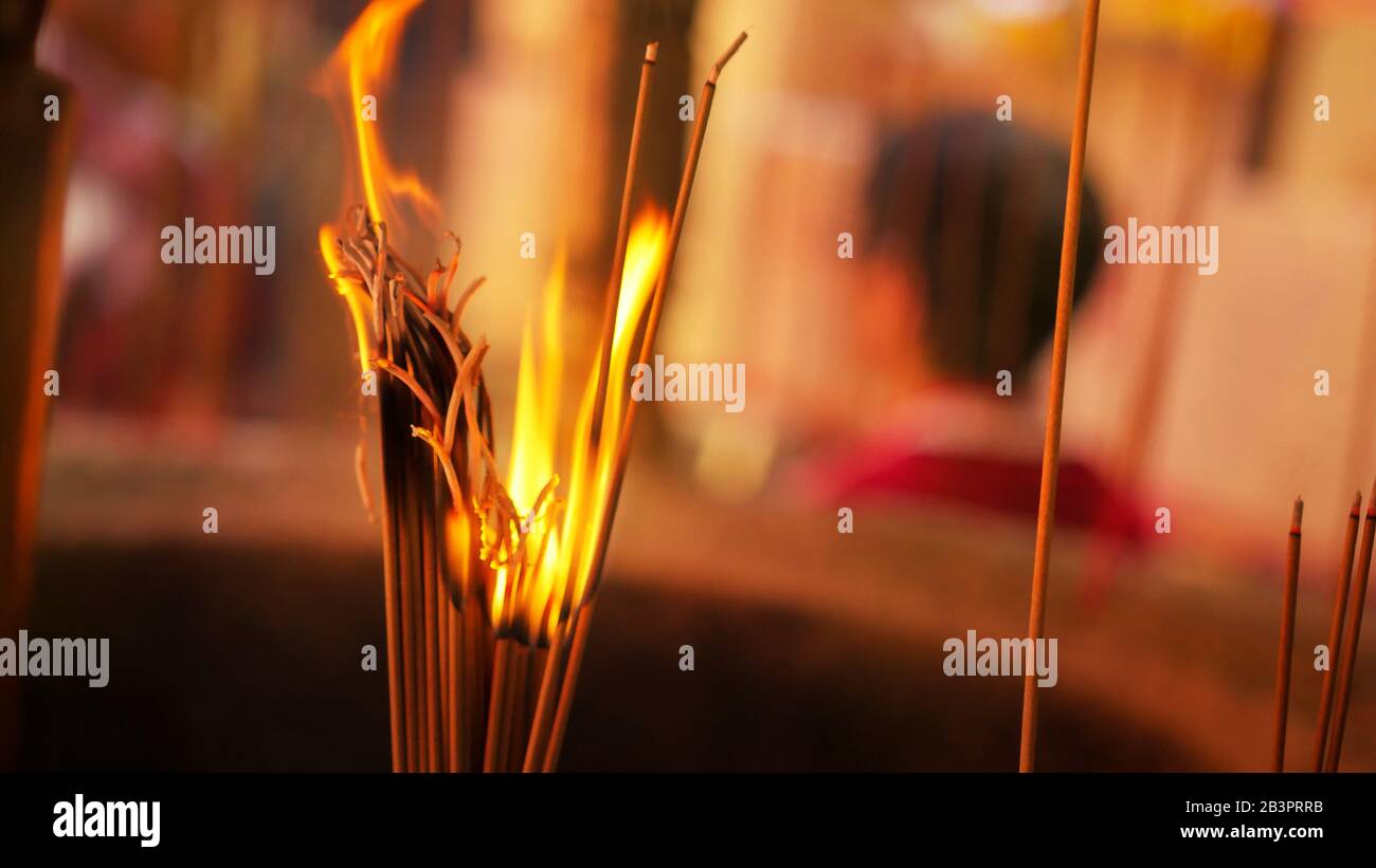 Fire to light incense sticks hi-res stock photography and images - Alamy