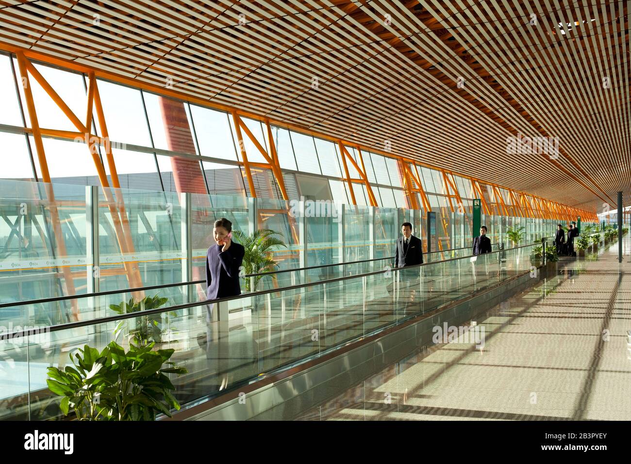 Beijing, China, Airplane crew on a transportation belt on arrival at ...