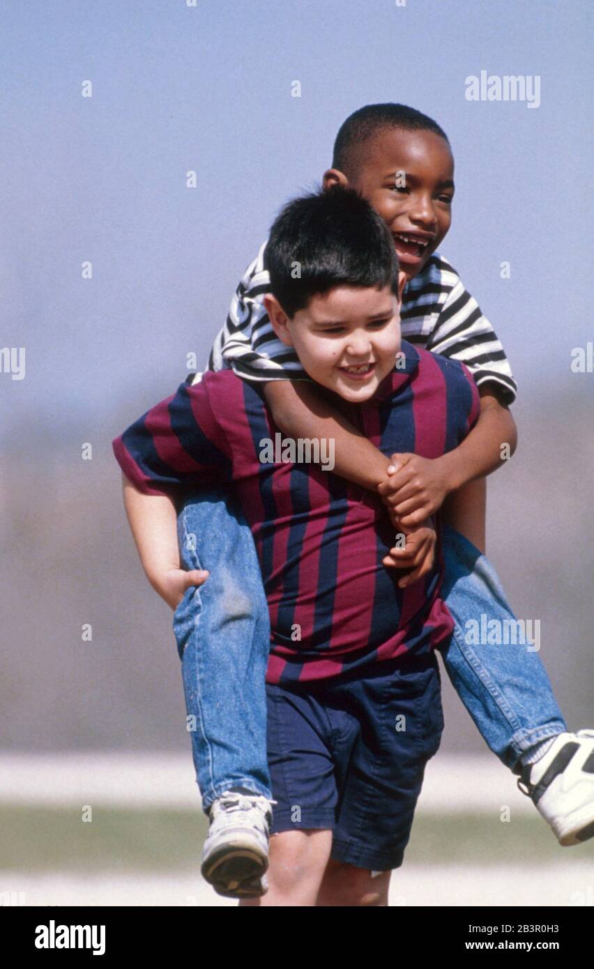Austin Texas USA, circa 1988: African-American and Hispanic boys ...