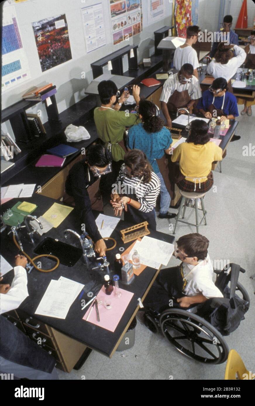 Austin, Texas USA, circa 1997: Handicapped boy in wheelchair ...
