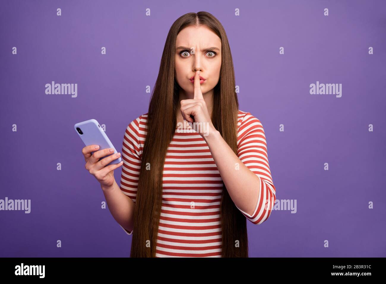 Be quiet dont share. Serious youth girl use smartphone have private ...