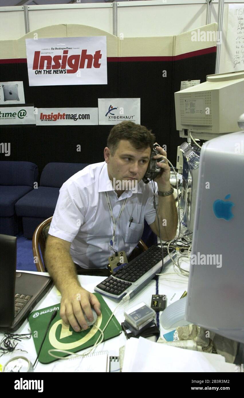 Philadelphia Pennsylvania USA, August 2000: Man working on computer in ...