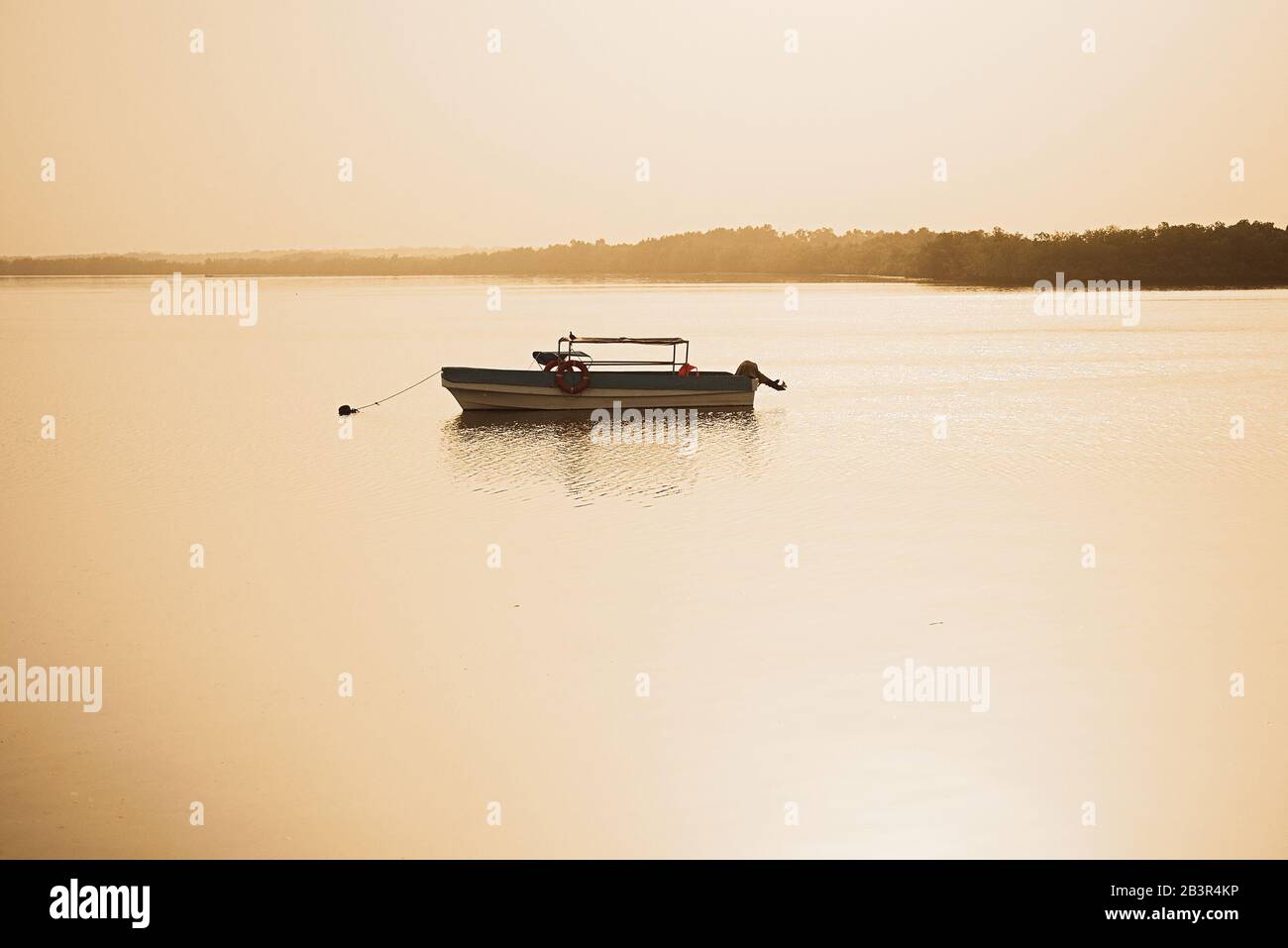 beautiful evening Sunset seen the fishing boat Stock Photo - Alamy