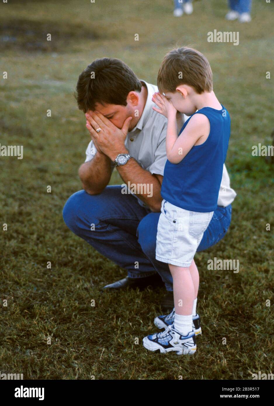 Son imitating father hi-res stock photography and images - Alamy