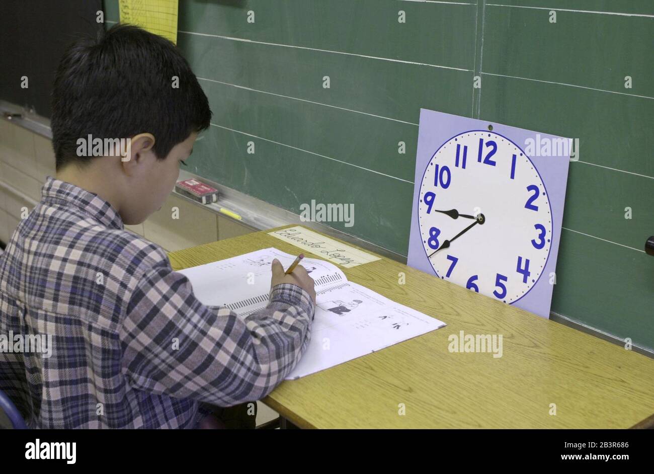 Boy taking standarized test hi-res stock photography and images - Alamy