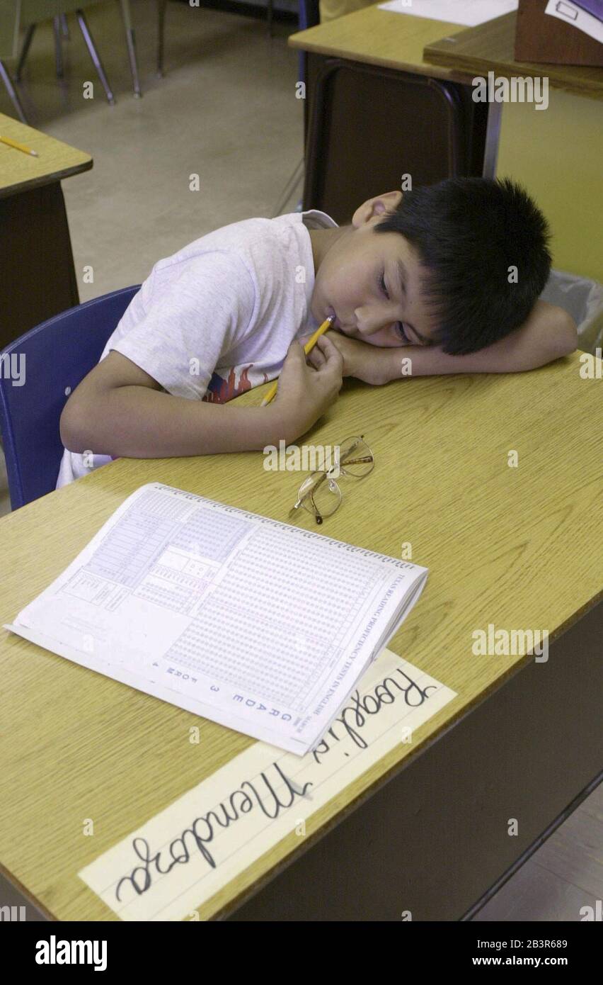 Boy taking standarized test hi-res stock photography and images - Alamy