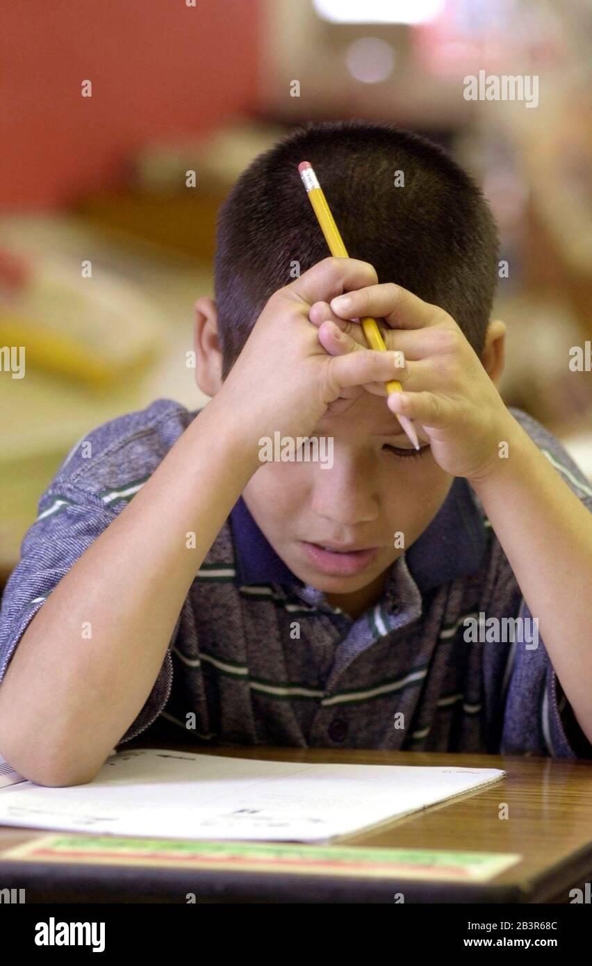 Boy taking standarized test hi-res stock photography and images - Alamy