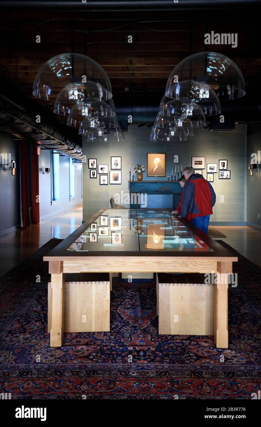 Visitors viewing the digital library of bourbon-related content resides ...
