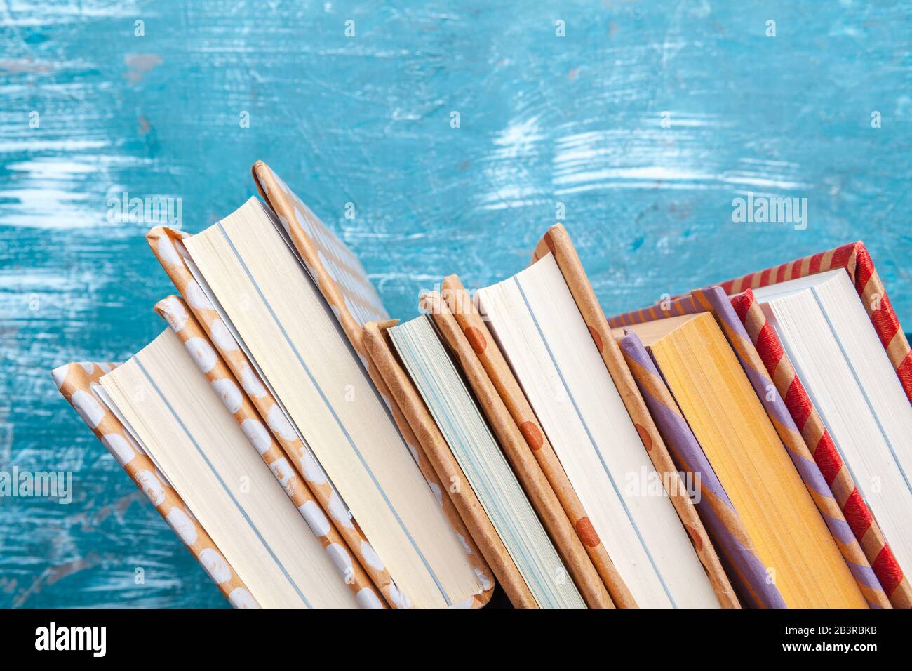 paperback books on a table. creative photo Stock Photo - Alamy