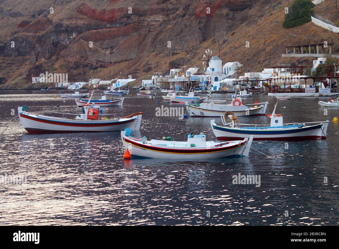 Typical boats of fishermen in Cyclades islands Stock Photo - Alamy