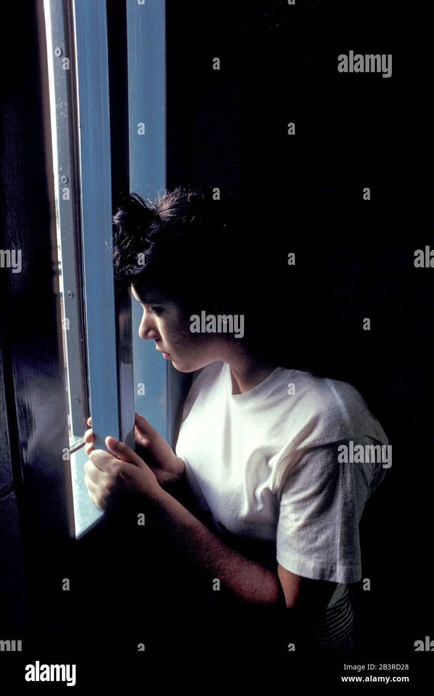 Austin, Texas USA, circa 1996: Female teen inmate (model) in juvenile ...
